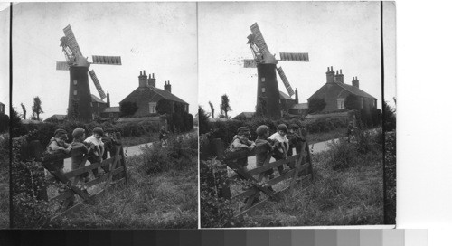 An English windmill and road scene near Spalding. England — Calisphere