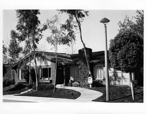 [Casta del Sol model home exterior, plan F, Flora photograph] — Calisphere