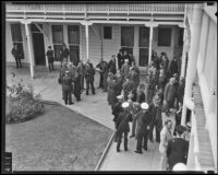 Marines and government officials mingle in the courtyard of the Hotel del Coronado, Coronado ...