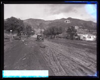 Muddy street after flooding caused by heavy rains, Burbank, 1928 ...