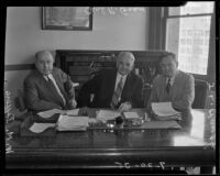 William M. Jeffers, Carl R. Gray, and J. L. Haugh discuss the railroad ...