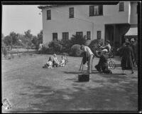 Gettle children posing for photographers on the lawn of their home ...
