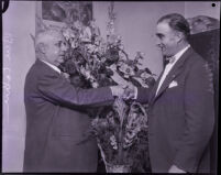 George Contreras and Ben Cohn shaking hands, Los Angeles, 1927 — Calisphere