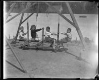 Gettle children play on their swing set during William F. Gettle's ...