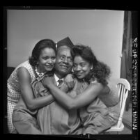 72 year-old handyman Daniel Elmore being hugged by daughters after his ...