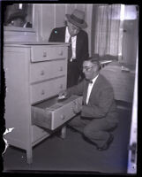 Detectives in a room at the La Vina Sanatorium, where murder suspect ...