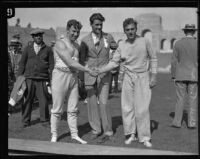 Charley Paddock, Charles Hoff and a third athlete at the Coliseum, Los ...