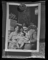 Daniel Banwer, with an unidentified woman, holding a baby, Los Angeles ...