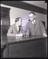 Jacob Berman in a witness stand questioned by chief deputy district ...