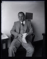 Suspect Ed Dudley seated, Los Angeles, 1934 — Calisphere