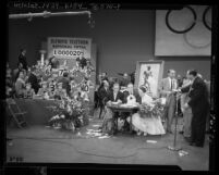 Bing Crosby, Bob Hope and Dorothy Lamour surrounded by band and ...