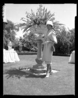 Actress Dana Wynter in the gardens of Mrs. Howard Ahmanson, Los Angeles ...