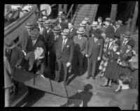 Jurors wait to board Walter Wanderwell's yacht, Carma, during the trial ...