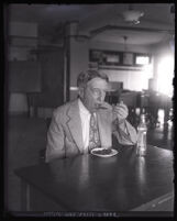 Los Angeles Health Commissioner Dr. George Parrish eating lunch, Los ...