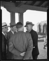 Professor Raymond T. Moley chatting with others, Los Angeles, 1933 ...