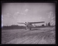 Lockheed monoplane on a dirt field, Los Angeles, 1929 — Calisphere