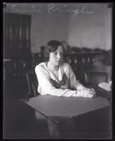 Eunice Pringle sitting with her arms on a desk, Los Angeles, 1929 ...