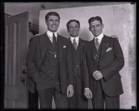 Dr. James W. Brougher standing between his two sons, James and Russell ...