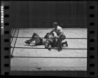 Wrestling match between Joseph “Jumping Joe” Savoldi and Mayes McLain ...