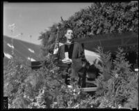 Dr. James W. Fifield Jr. standing at podium probably at the Coliseum ...