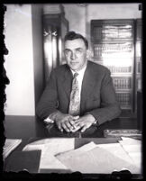 Judge Harry Falk sits at desk during the Leo Patrick Kelley murder case ...