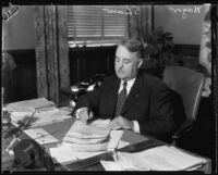 Los Angeles Mayor Frank Shaw at desk with papers, Los Angeles, 1933 ...
