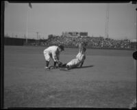 Baseball player Orville Mohler sliding into second base, Los Angeles ...