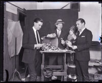 Actor Eddie Borden actress Midgie Miller and another actor in costume ...