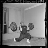 Weightlifter Norbert Schemansky training for 1964 Olympics — Calisphere