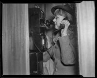 Gertrude Niesen, actress and singer, at telephone, 1937 — Calisphere