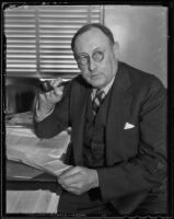 Judge Charles S. Burnell at his desk, Los Angeles, 1936 — Calisphere