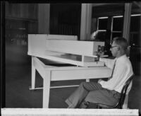 Dr. Seth B. Nicholson sits at his spectroscope, Pasadena vicinity, 1929 ...