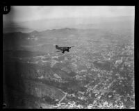 Art Goebel's monoplane, Yankee Doodle, in flight, circa 1928 — Calisphere
