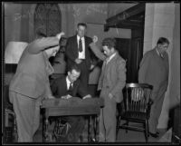 Charles K. Basil is sworn in at court, Los Angeles, 1934 — Calisphere