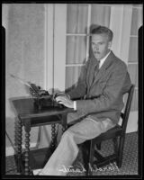 Harold Lamb, author, seated at his typewriter, Los Angeles, 1935 ...