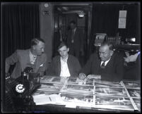 Undersheriff Frank Dewar, murder suspect Lowell Bell and Deputy Sheriff ...