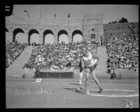 John Kuck competing in shot put at the Coliseum, Los Angeles, circa ...