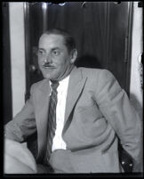Suspect Ed Dudley, seated, Los Angeles, 1934 — Calisphere