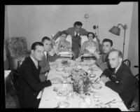 Walter Byron and six other actors seated around a dining table, 1928 ...
