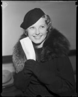 Actress Jean Chatburn smiles with a signed contract in hand, Los ...