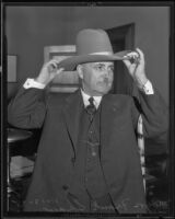 Mayor Frank Shaw adjusts his ten-gallon hat, Los Angeles, 1935 — Calisphere