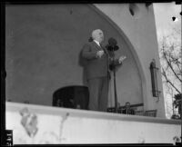 Governor Frank Merriam speaking on a stage, California, 1934-1939 ...