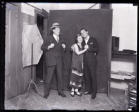 Actor Eddie Borden, actress Midgie Miller and another actor pose in ...
