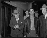 John F. Starnes Jr. and David Searcy being escorted by Detective ...