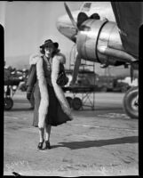 Actress Phyllis Brooks at an airfield, Los Angeles, 1937 — Calisphere