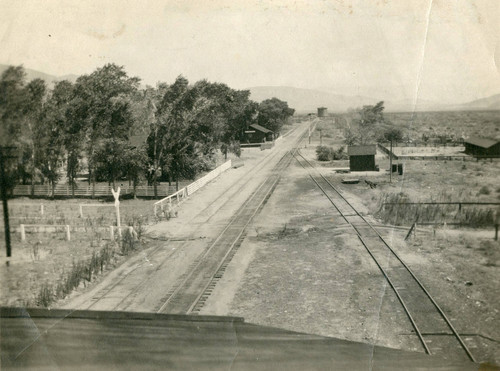 Early photograph of the Southern Pacific Railroad tracks and depot in ...