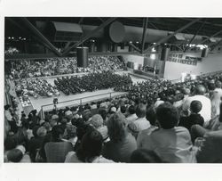 Graduation ceremony in Firestone Fieldhouse, circa 1980 — Calisphere