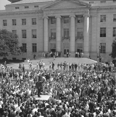 View of Sproul Plaza with Mario Savio on top of police car — Calisphere