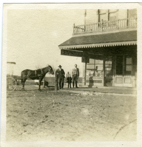 Photograph of Henry Osborn leaning against a hitching post in Turlock ...