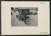Manzanar, Calif.--Evacuees of Japanese ancestry await bus for Manzanar ...